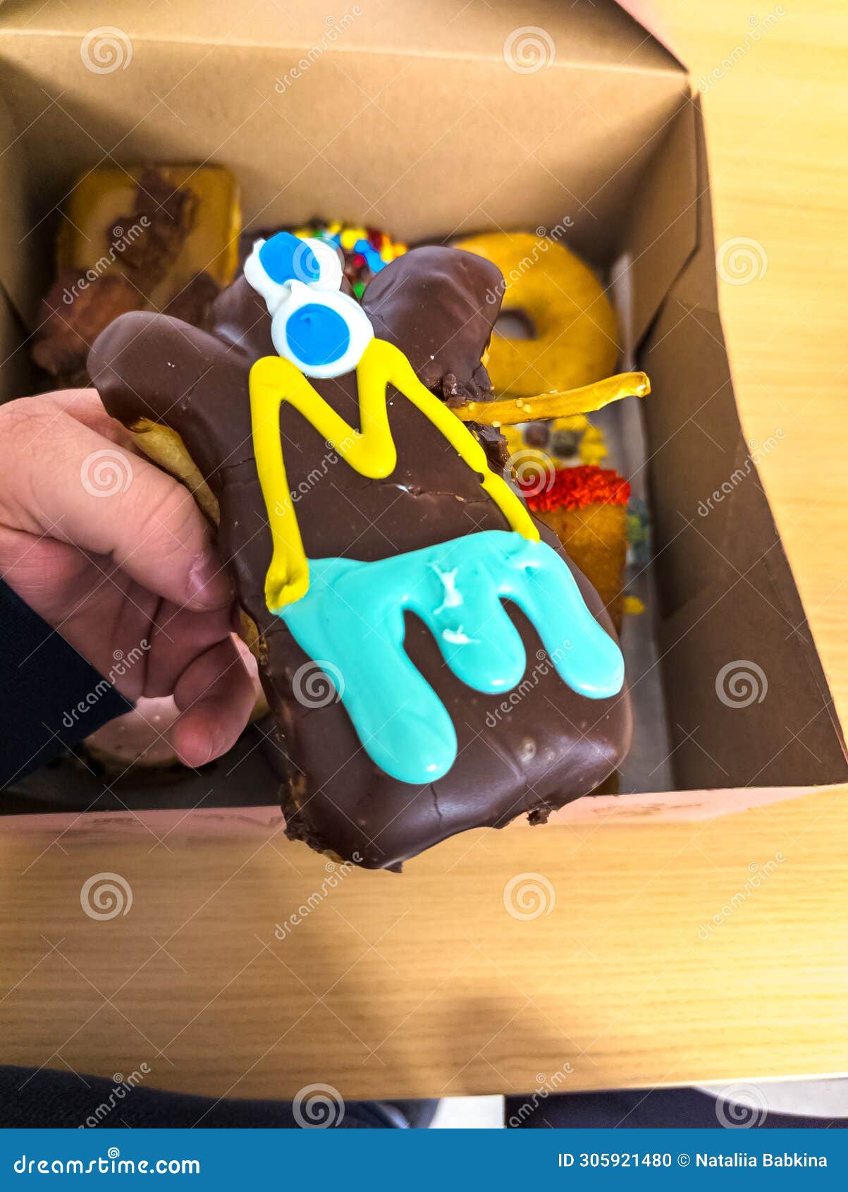 Multi-colored Donuts in a Box from the Voodoo Donut Retail Store in ...
