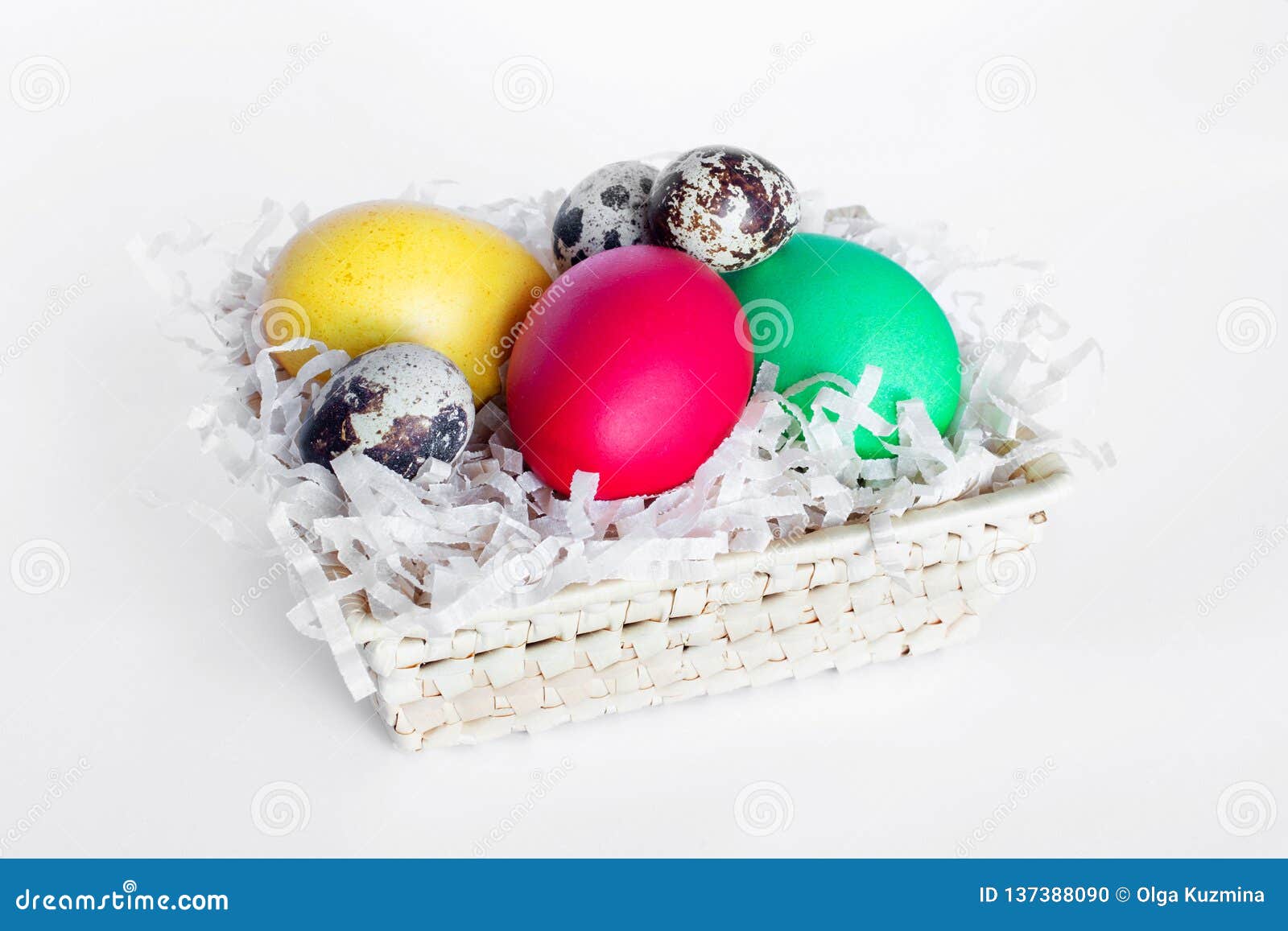 Multi-colored Easter Eggs Lie in a Basket on a White Background. Yellow ...