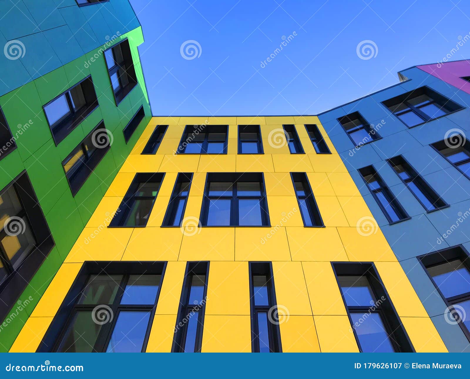 Multi-colored Facades of the School with Black Window Frames. Stock ...