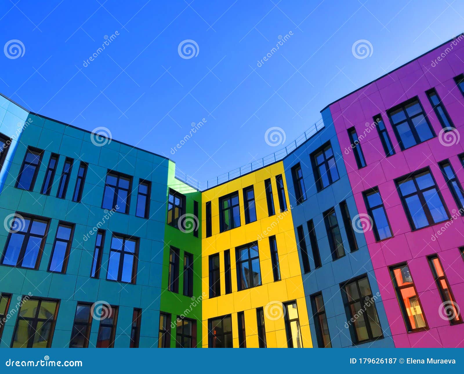 Multi-colored Facades of the School with Black Window Frames. Stock ...