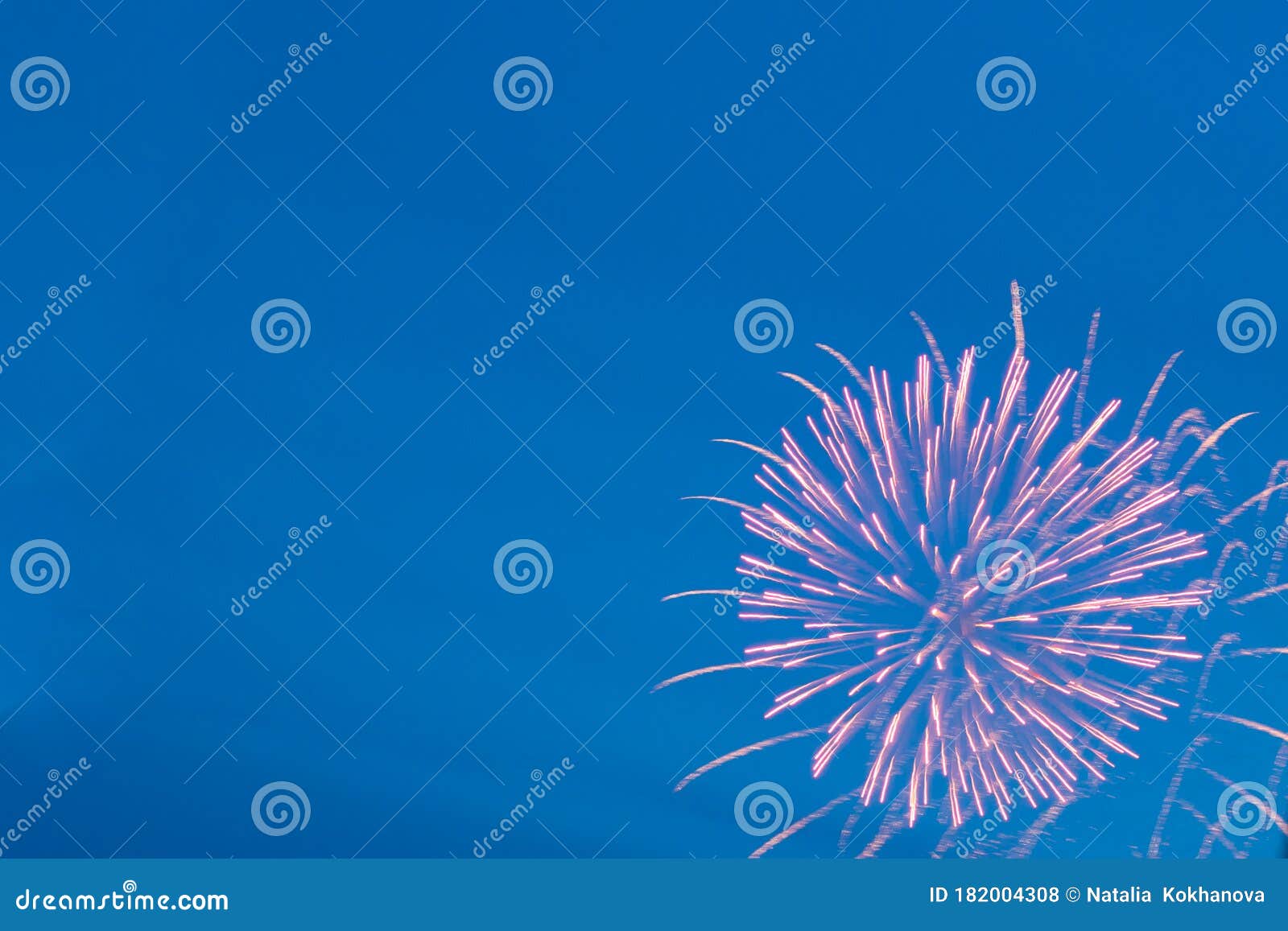 Multi-colored Fireworks Against the Dark Blue Sky in the Right Corner ...