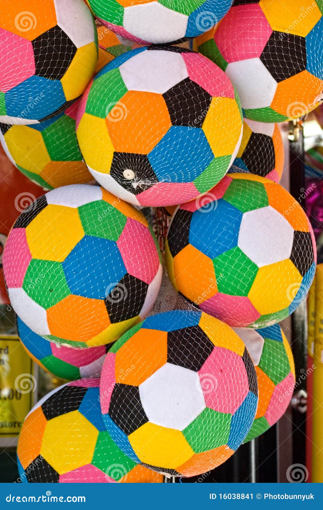 Multi Colored Footballs Hanging Up. Stock Image - Image of blue, retail ...