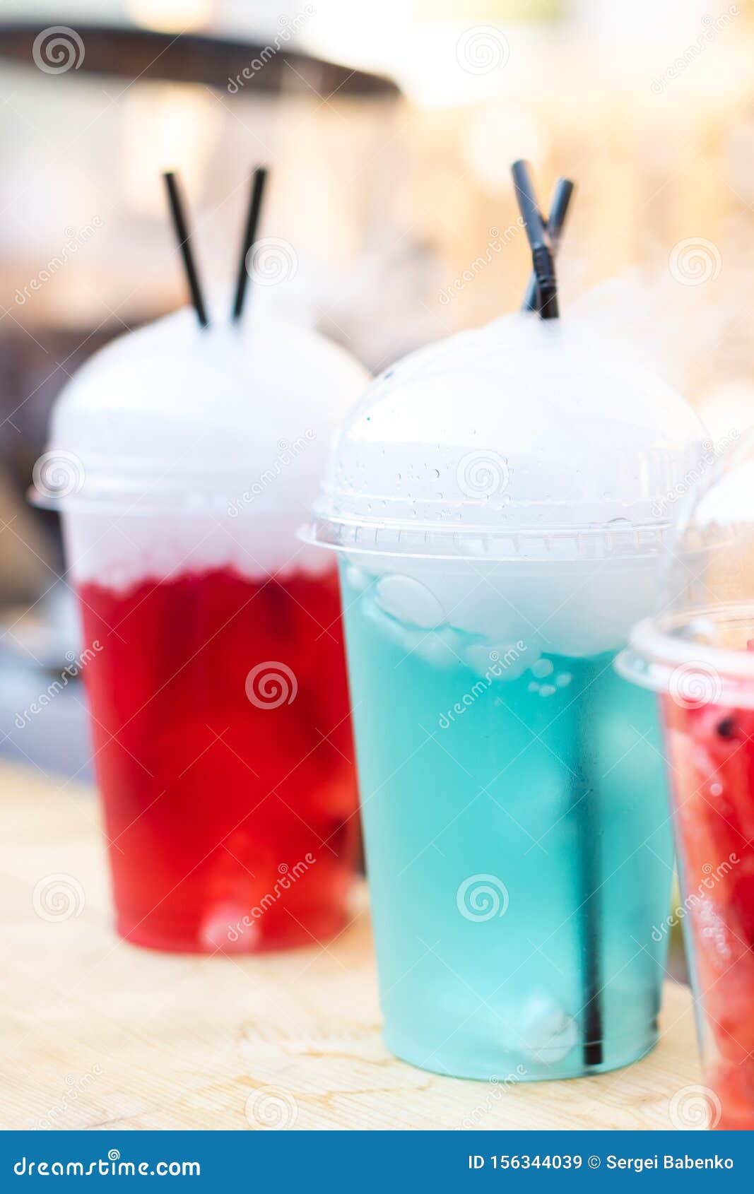 Multi-colored Fruit Drink with Outgoing Steam. Non Alcoholic Cocktail ...