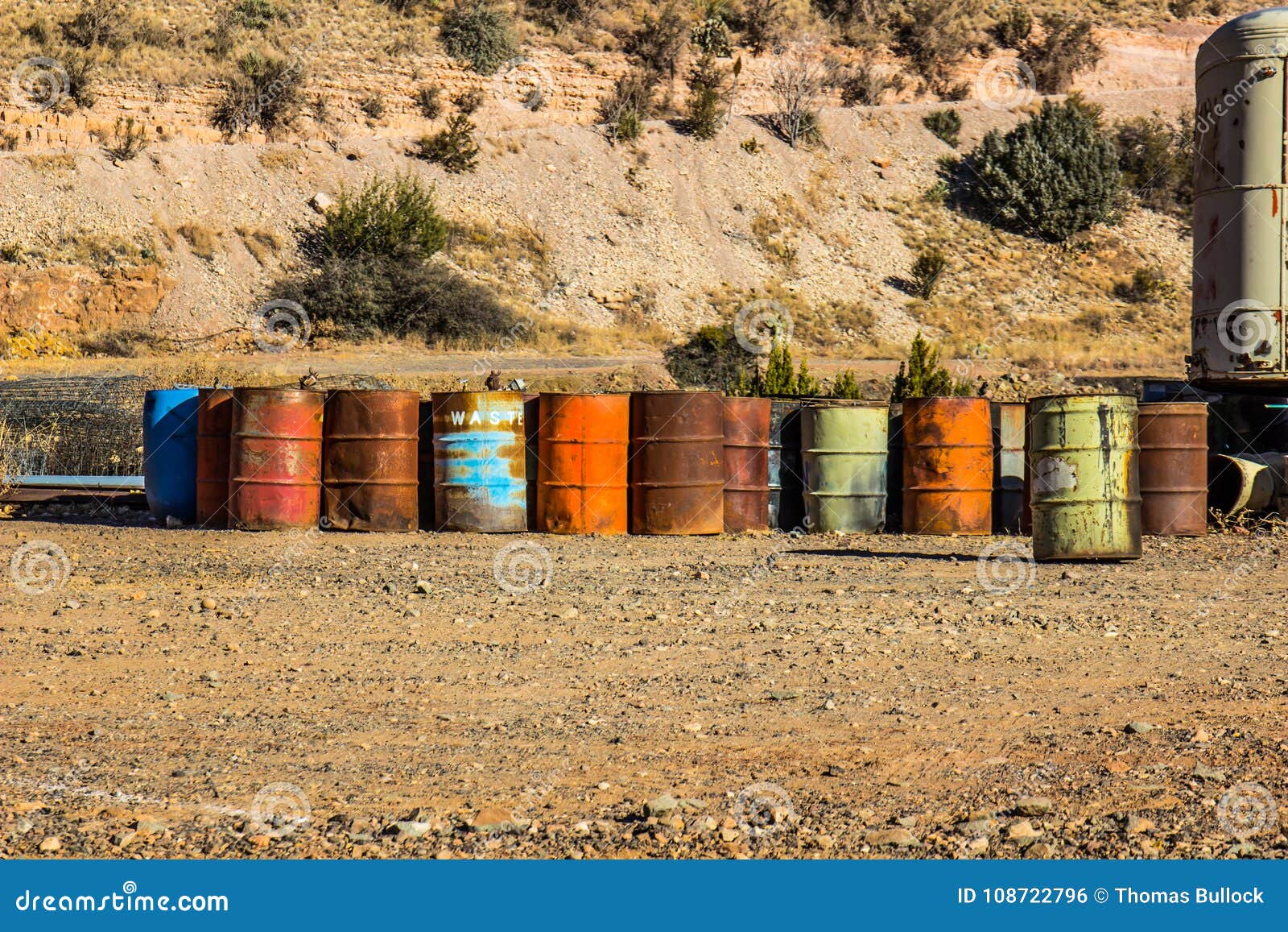 Multi Colored 50 Gallon Drums in Junk Yard Stock Photo - Image of ...