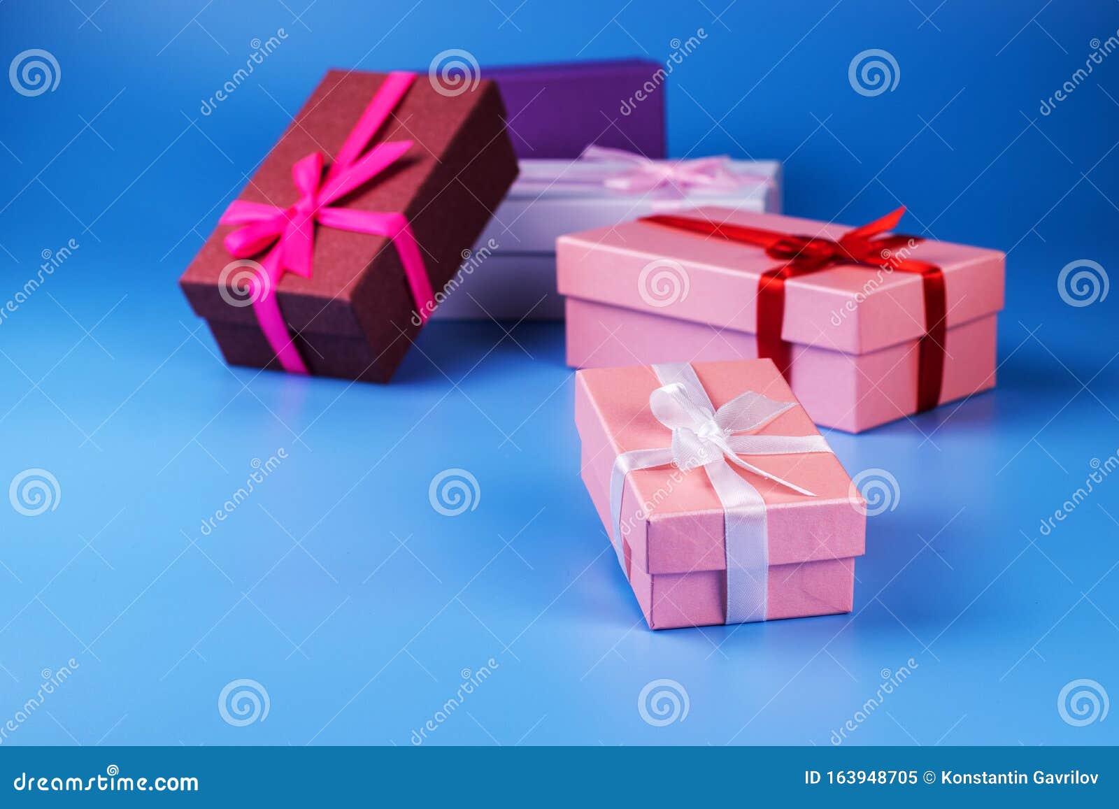 Multi-colored gift boxes stock image. Image of holiday - 163948705