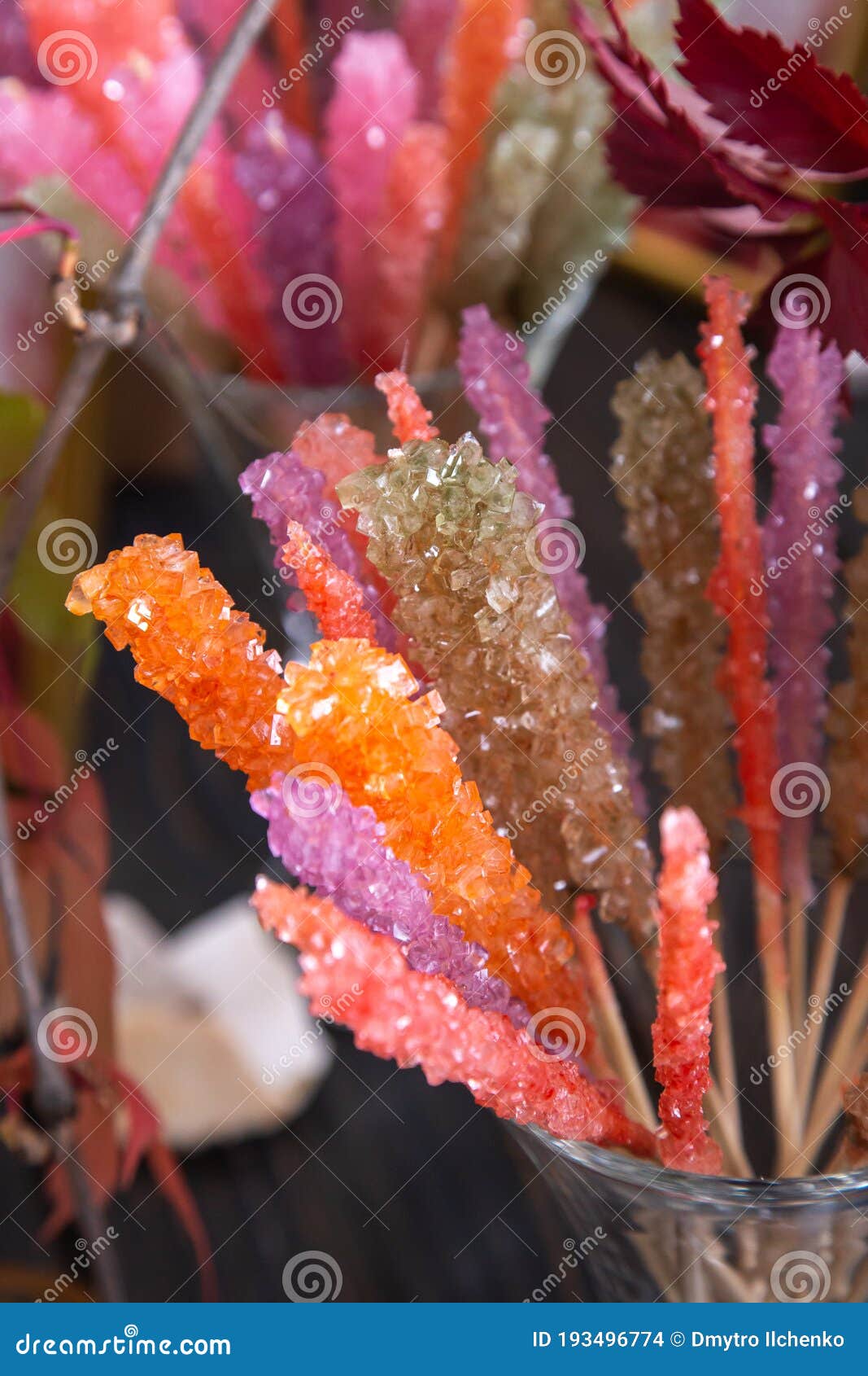 Multi-colored Lollipops with Large Crystals of Sugar on Sticks in Glass ...