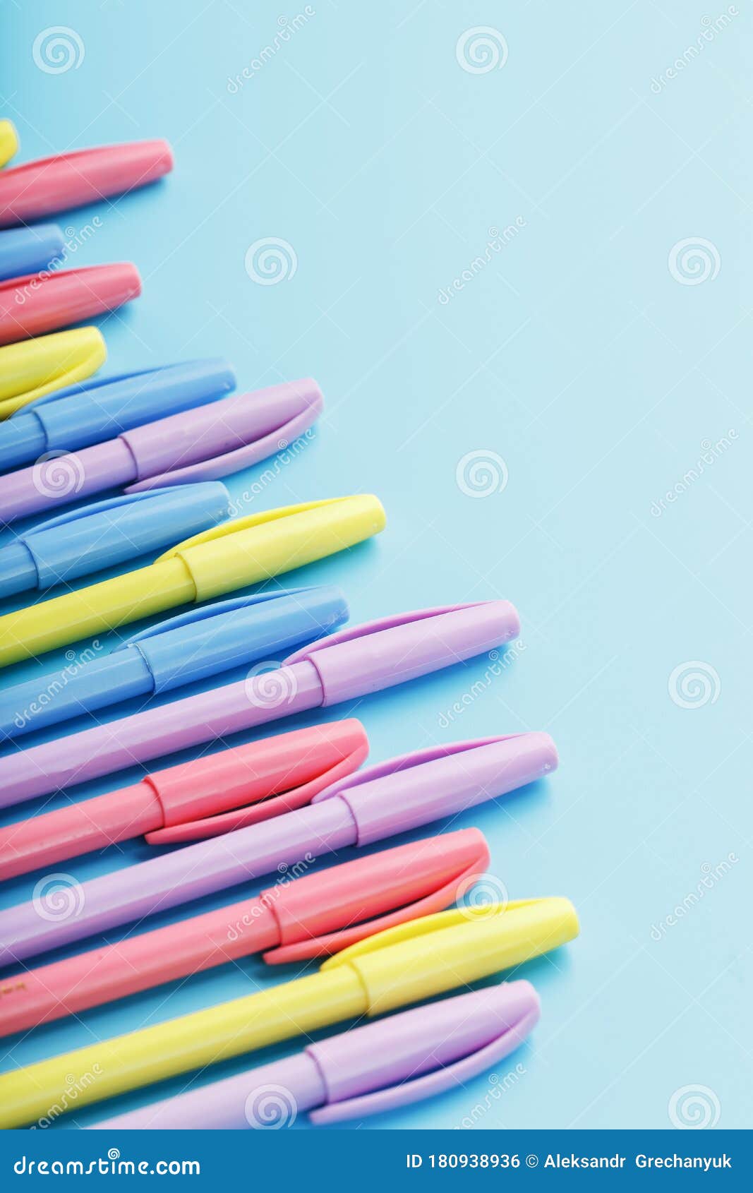 Multi-colored Markers on a Blue Background with Free Space Stock Photo ...