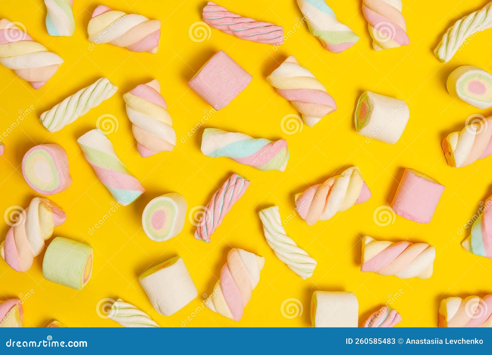Multi-colored Marshmallows. Yellow Background or Texture of Colorful ...
