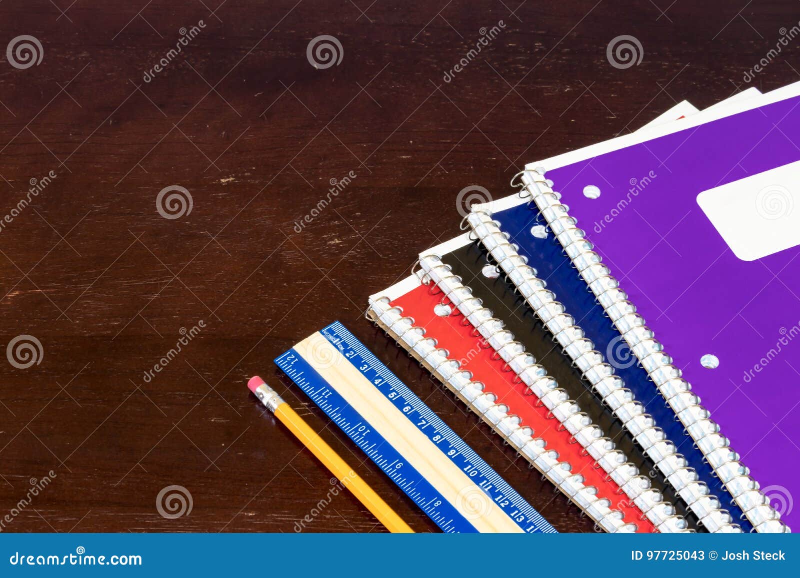 Multi Colored Notebooks Ruler and Pencil on a Table Stock Image - Image ...