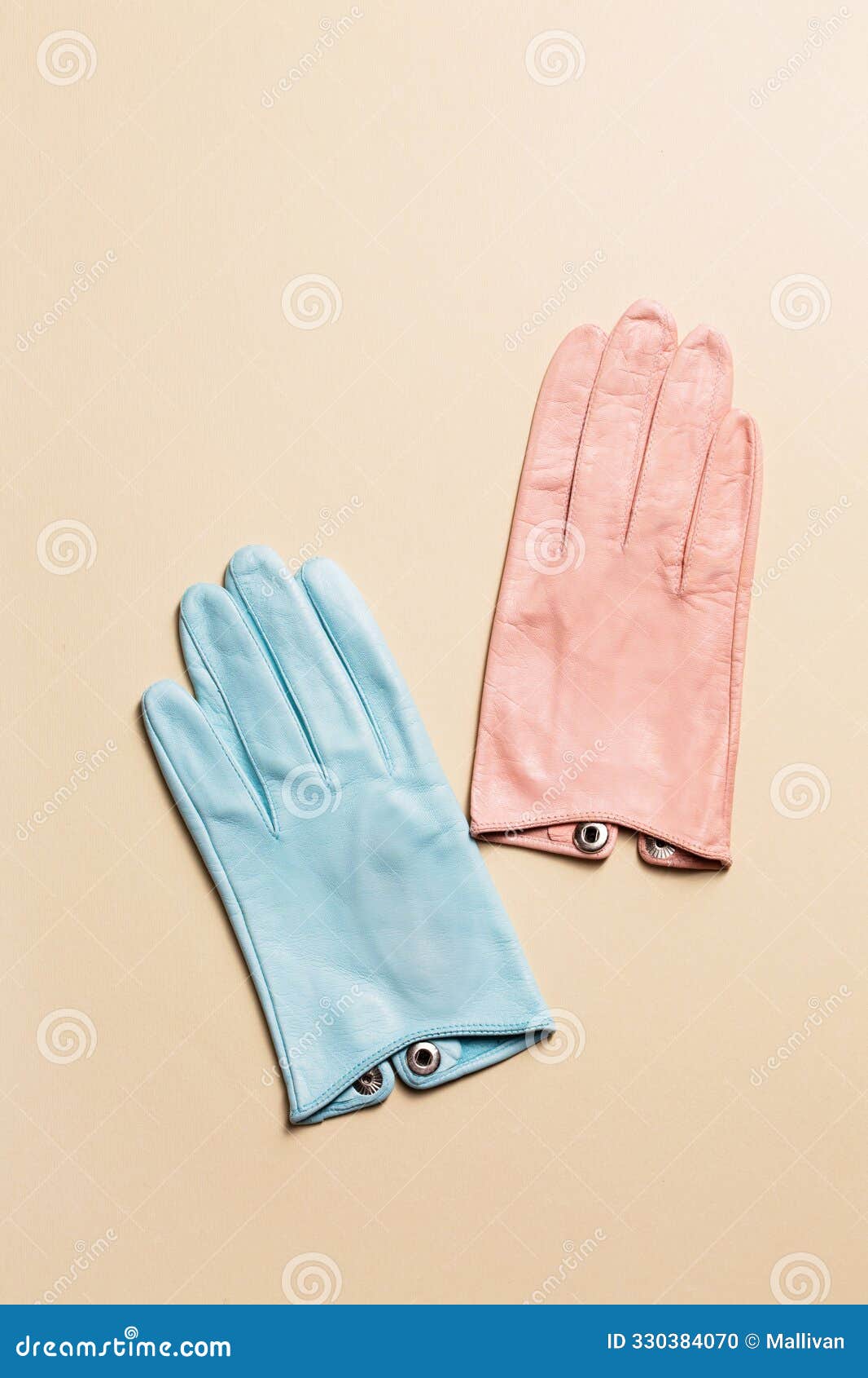 A Multi-colored Pair of Gloves on a Beige Background Stock Photo ...