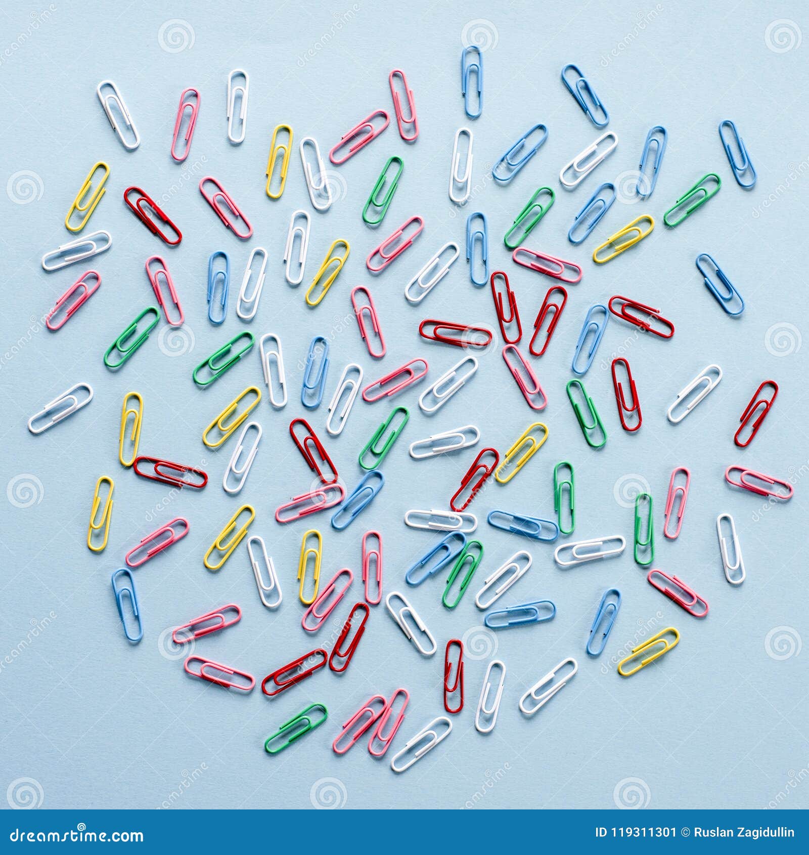 Multi-colored Paper Clips on Blue Background Stock Image - Image of ...