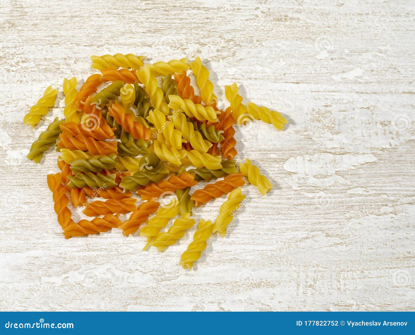 Multi-colored Pasta Scattered on the Kitchen Table Stock Photo - Image ...