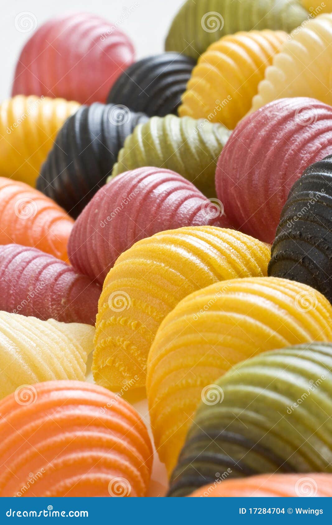 Multi colored pasta shells stock photo. Image of spiral - 17284704