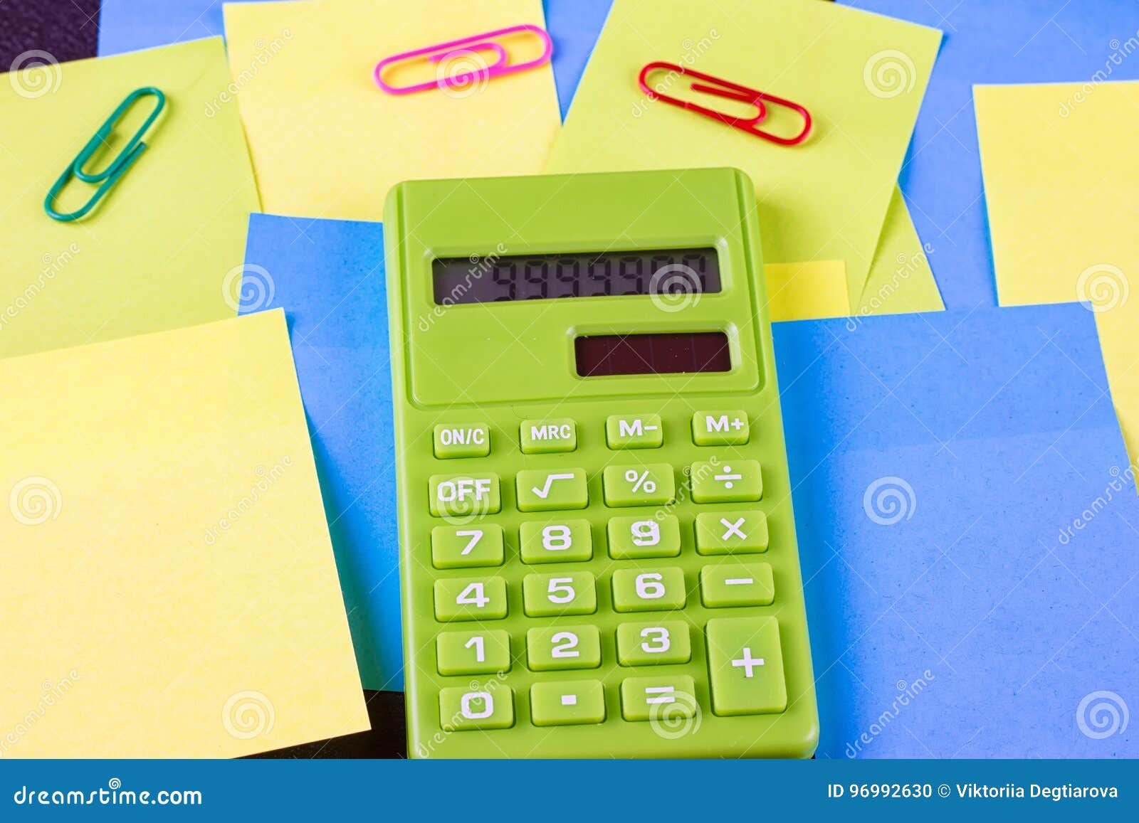 Multi-colored Pasted Stickers and Green Calculator Stock Photo - Image ...
