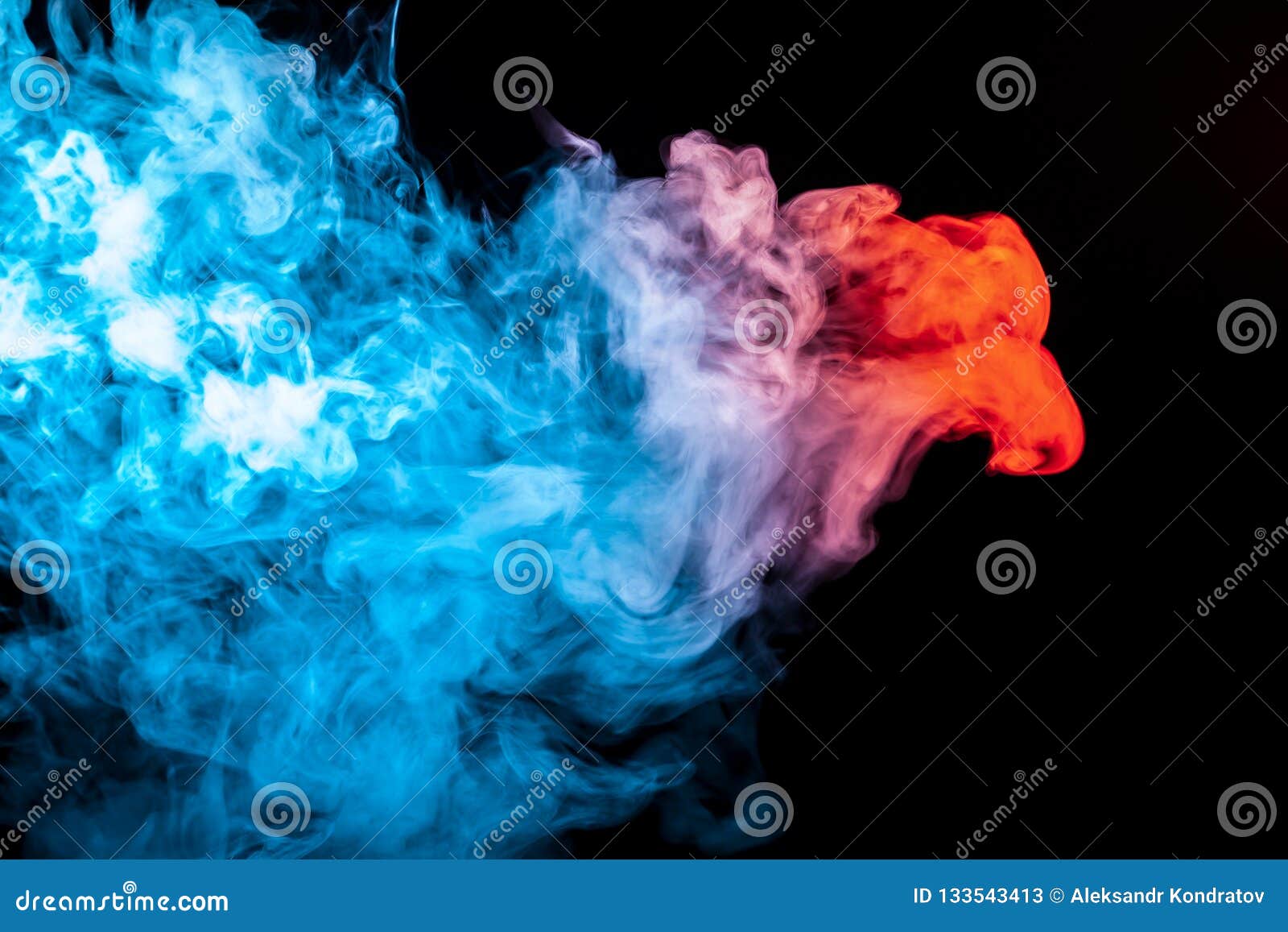 A Multi-colored Pattern of Blue and Red Smoke of a Mystical Shap Stock ...