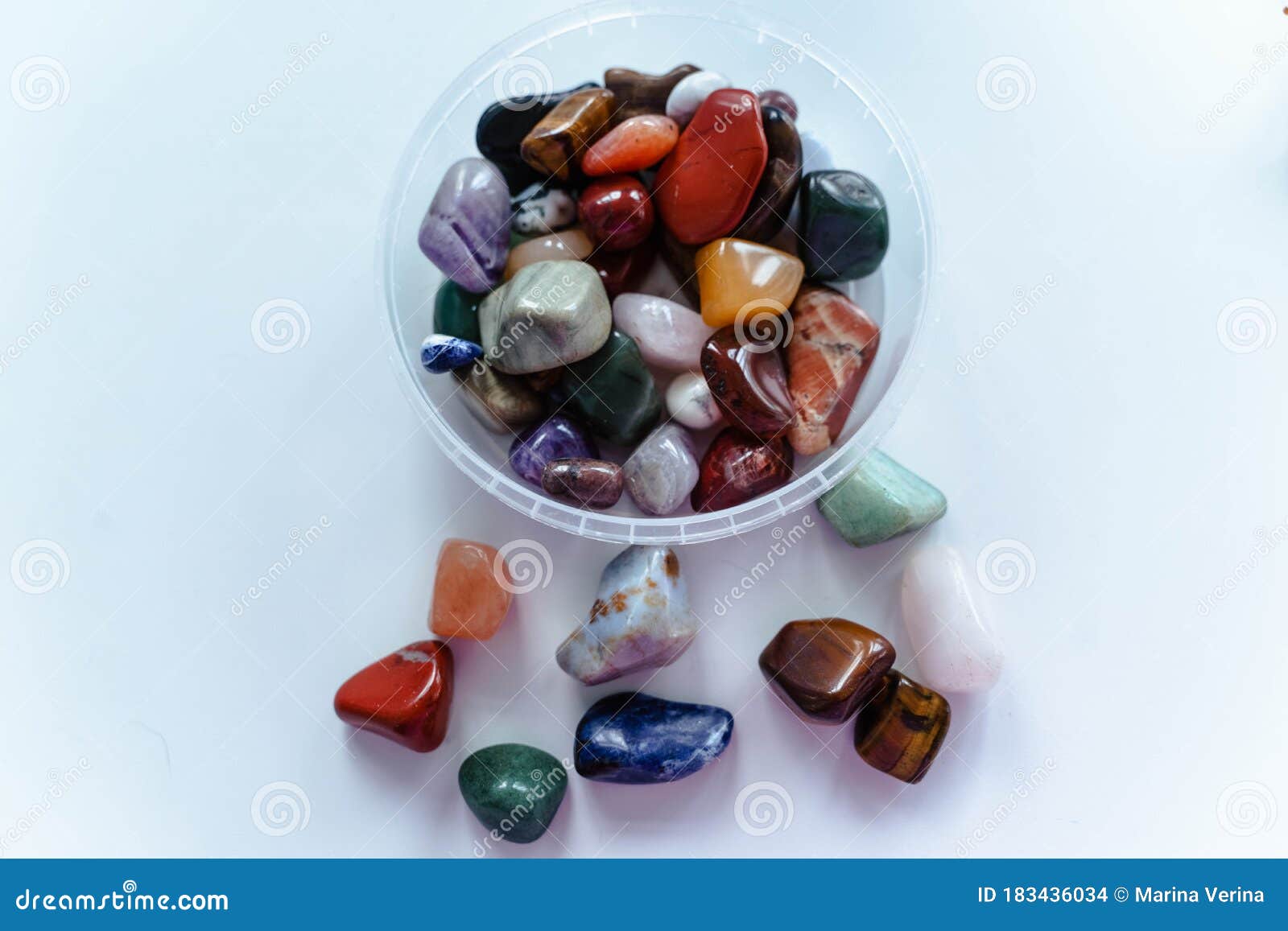 Multi-colored Pebbles of Different Sizes on a White Background Stock ...