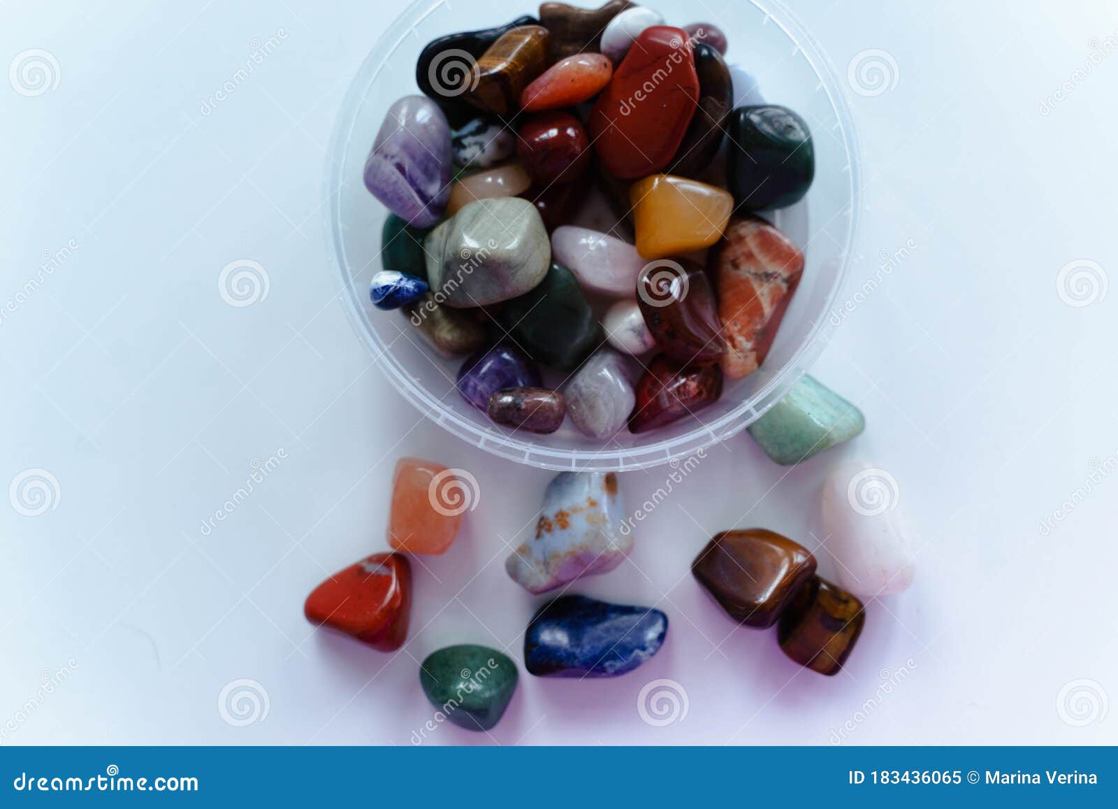 Multi-colored Pebbles of Different Sizes on a White Background Stock ...