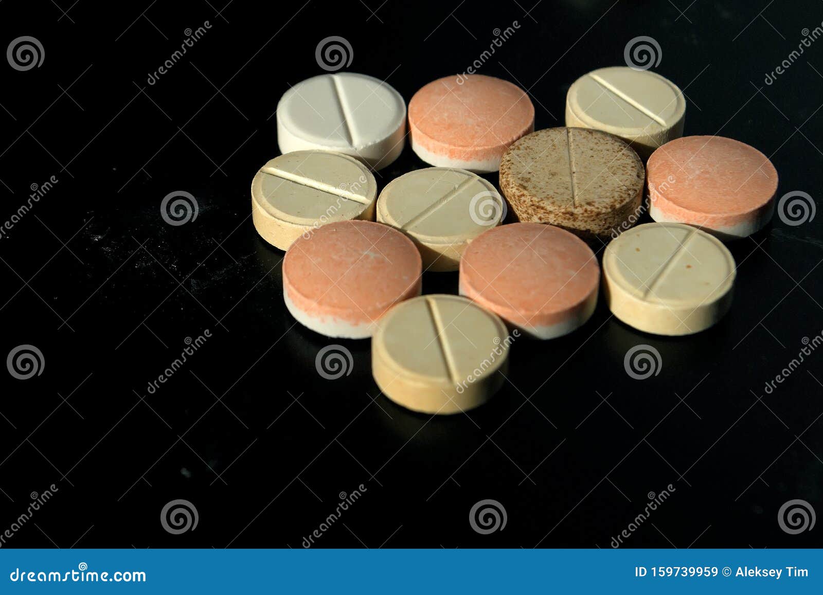 Multi-colored Pills on a Black Table. Multi-colored Round Pills Stock ...
