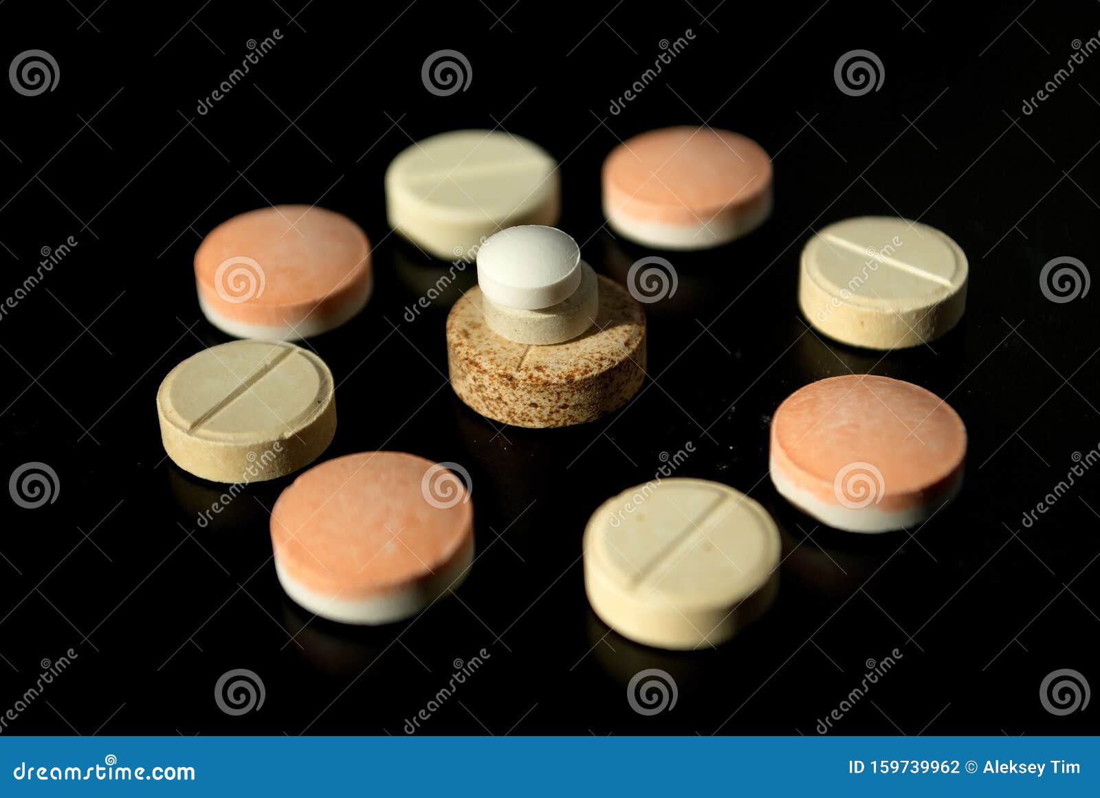 Multi-colored Pills on a Black Table. Multi-colored Round Pills Stock ...