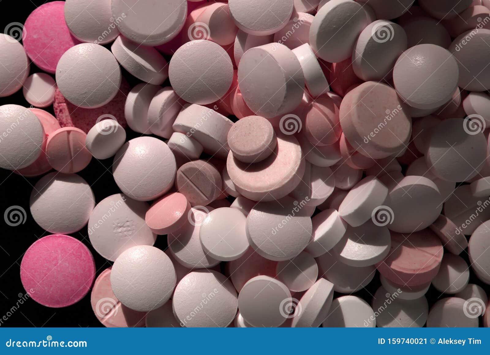Multi-colored Pills on a Black Table. Multi-colored Round Pills Stock ...