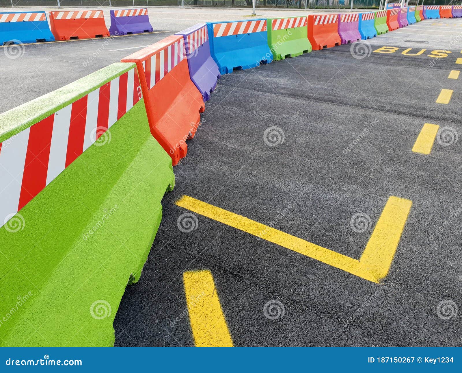 Multi-colored Plastic Barriers at the Bus Stop. Stock Image - Image of ...