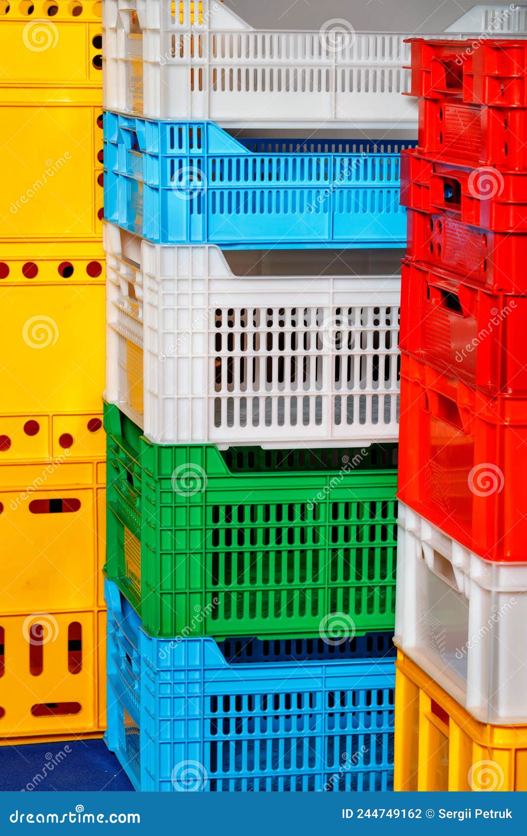 Plastic Multi Colored Boxes Stacked on Top of Each Other Stock Photo ...