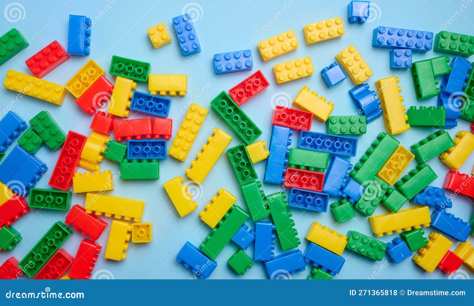 Multi-colored Plastic Cubes of a Children S Designer on a Blue ...