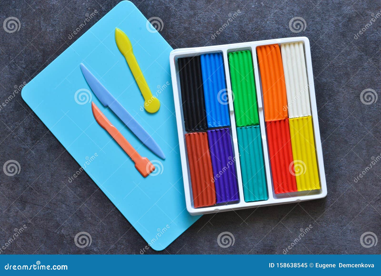 Multi-colored Plasticine and Modeling Board. View from Above Stock ...