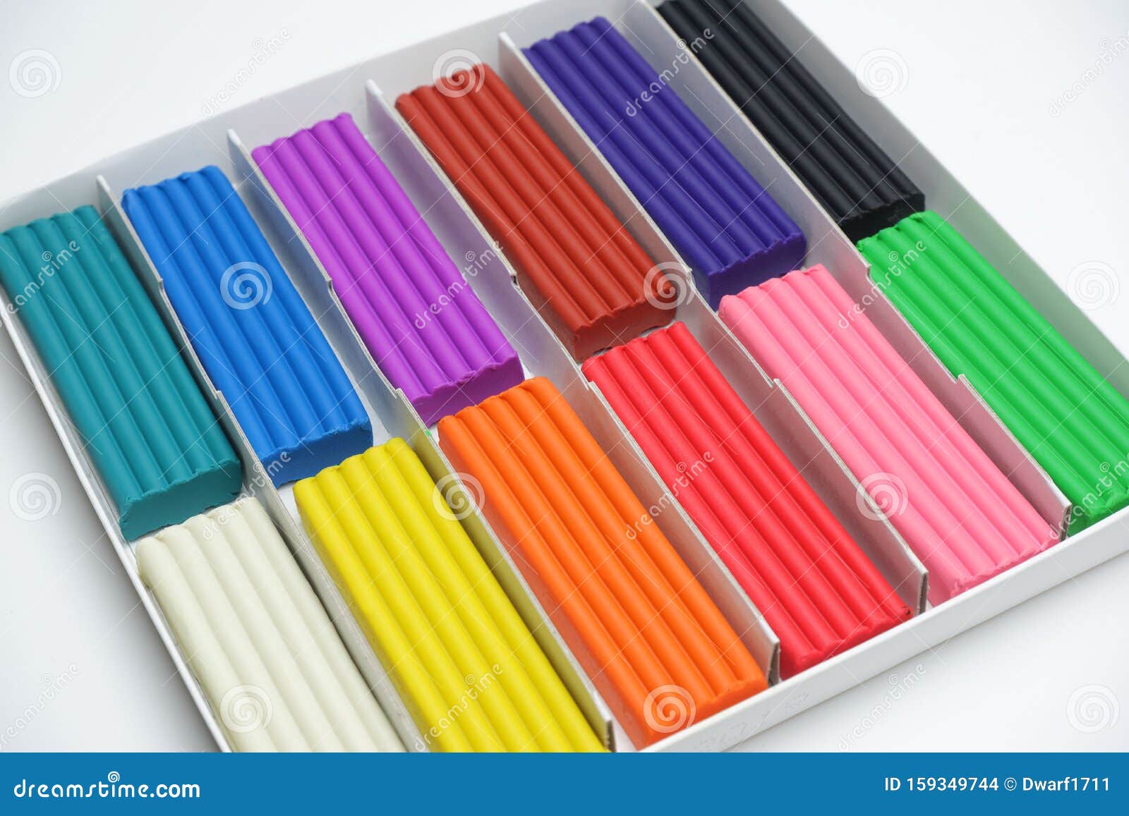 Multi-colored Plasticine Sticks in a Cardboard Box Stock Photo - Image ...
