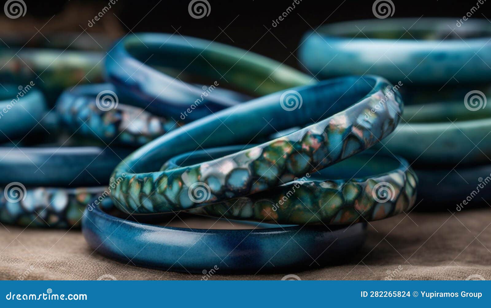 Multi Colored Pottery Bowl Stack, Shiny Metal Bracelet, Abstract ...