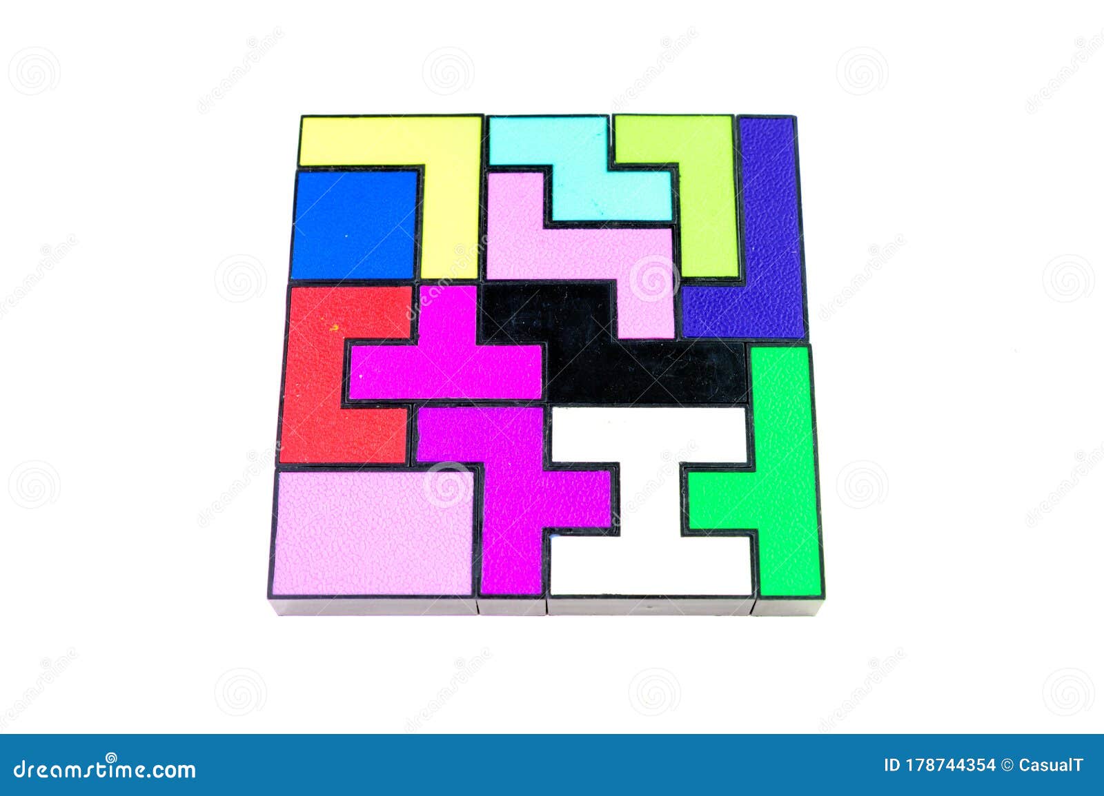 Multi-colored Puzzle Made of Plastic Blocks, Solved, Isolated on White ... Multi-colored Puzzle Made of Plastic Blocks, Solved, Isolated on White ...