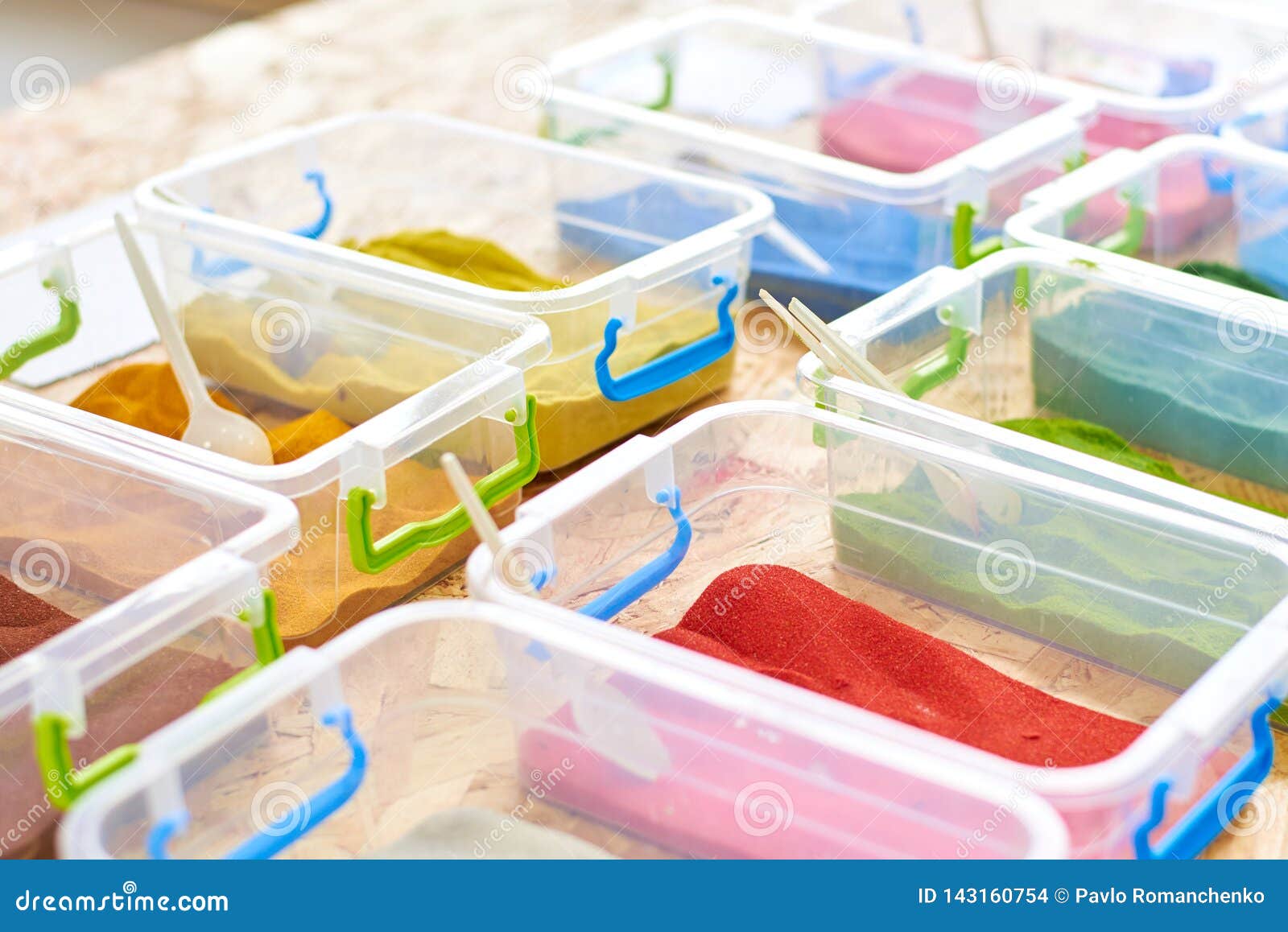 Multi-colored Sand for Drawing in Plastic Containers Stock Photo ...