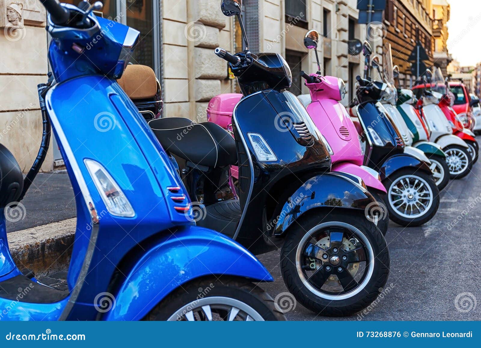 Multi-colored scooters stock photo. Image of line, wheels - 73268876