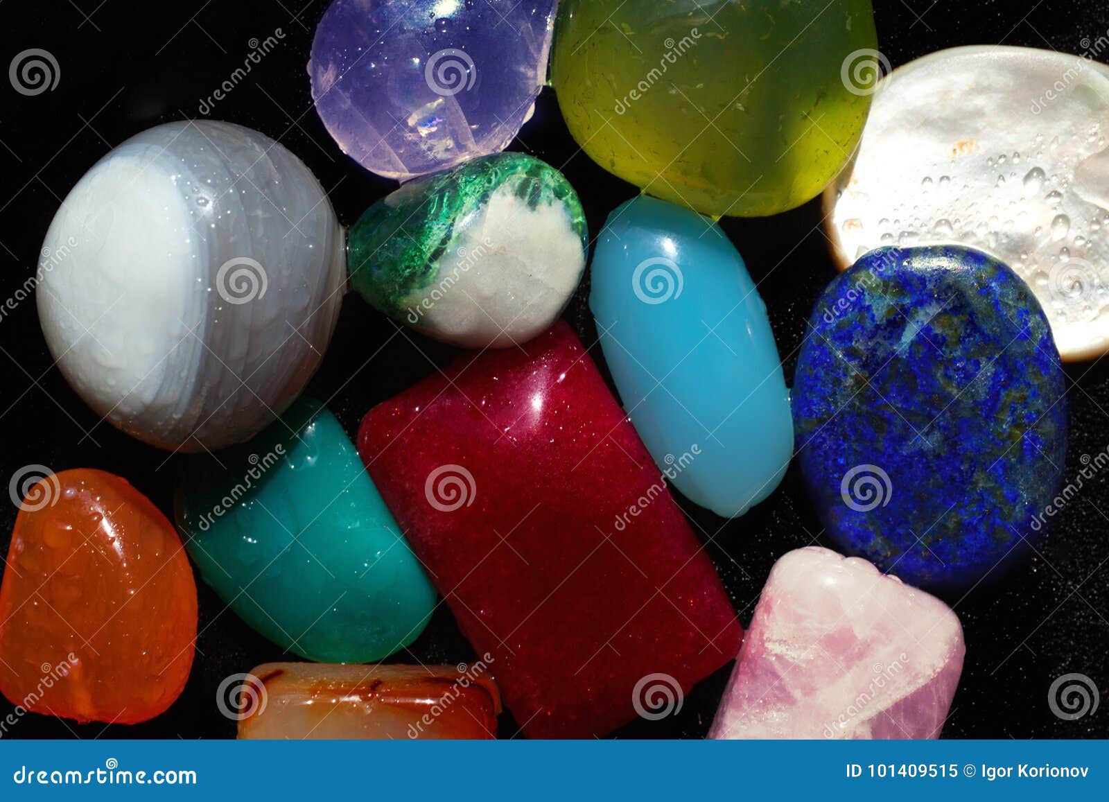 Multi-colored Semi-precious Stones on Black Close-up Stock Image ...