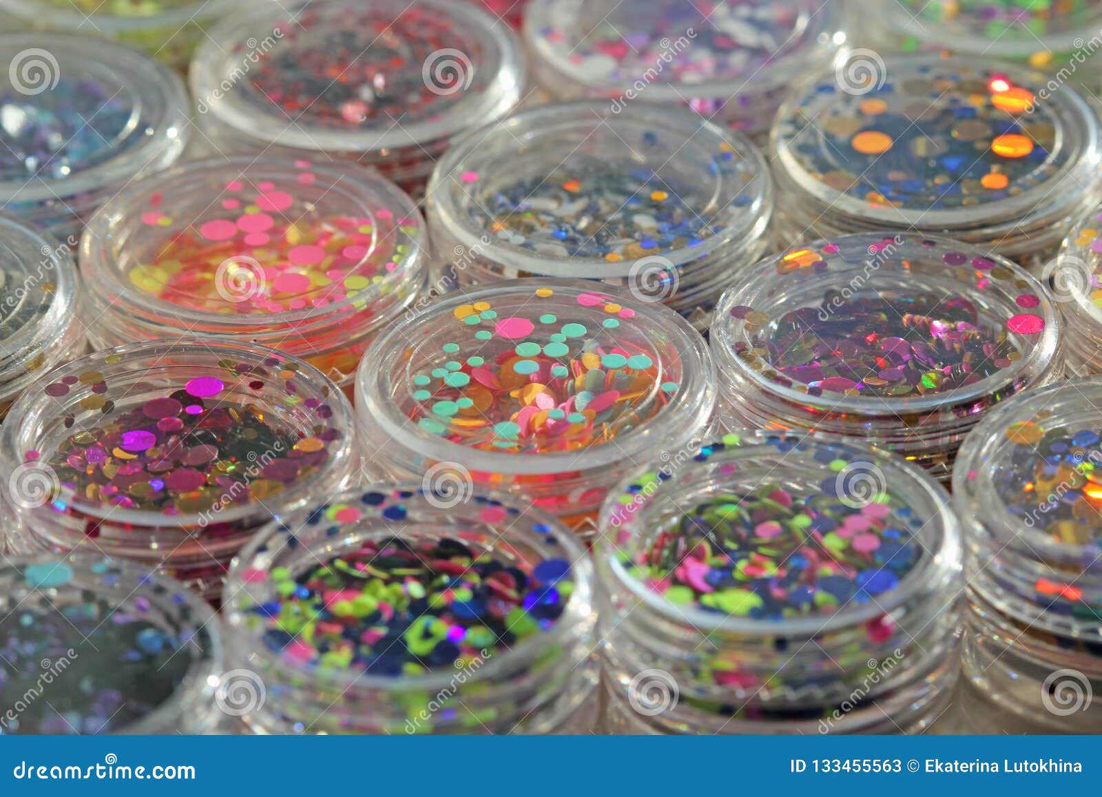 Multi Colored Sequins for the Design of Nails in a Jar. Glitter Stock ...