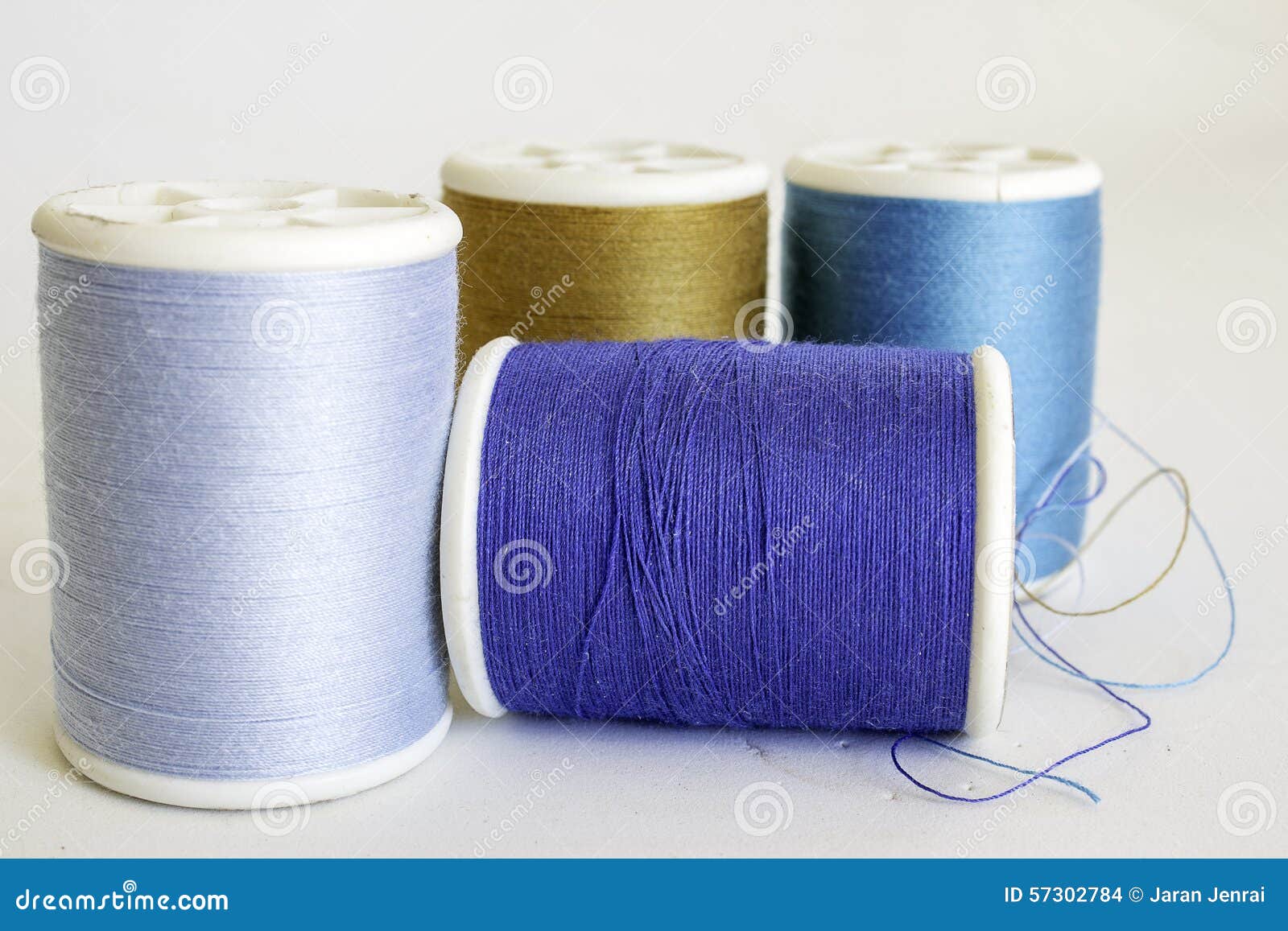 Multi-colored Sewing Thread Stock Photo - Image of sewing, blue: 57302784