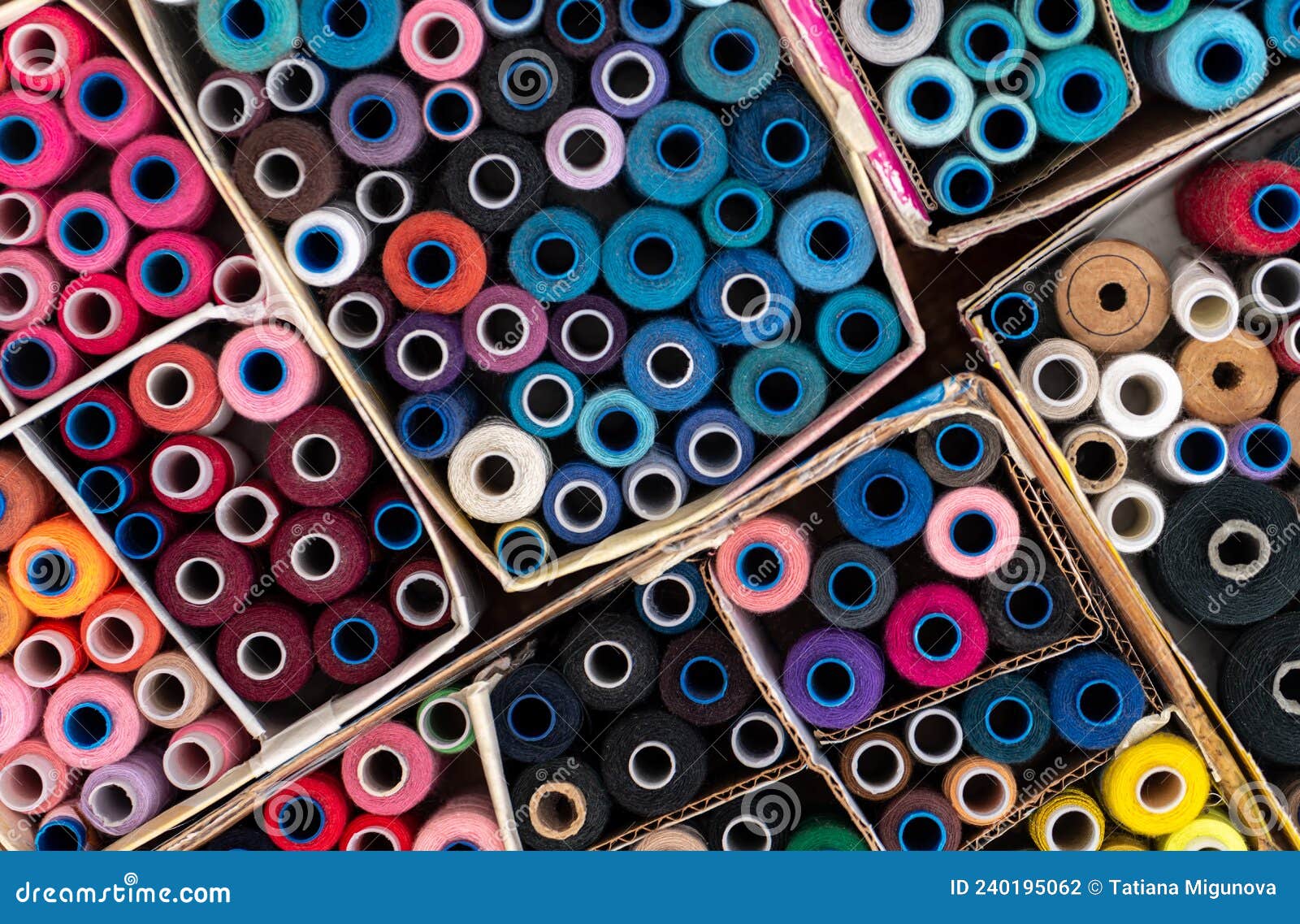 Multi-colored Sewing Threads Laid Out in a Row. Bright Background ...