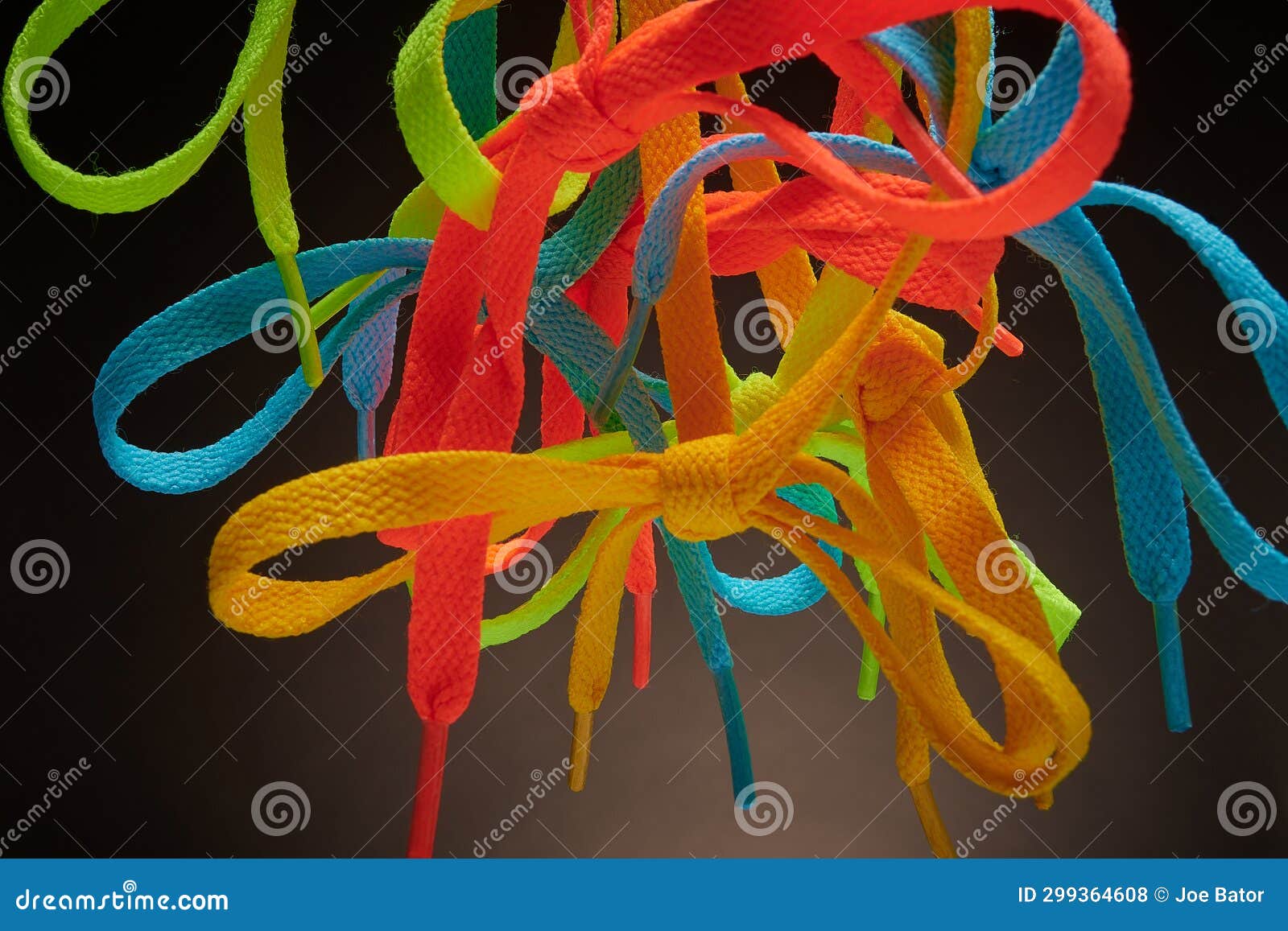 Brilliant Colored Shoe Laces Tied into Bows Stock Photo - Image of ...