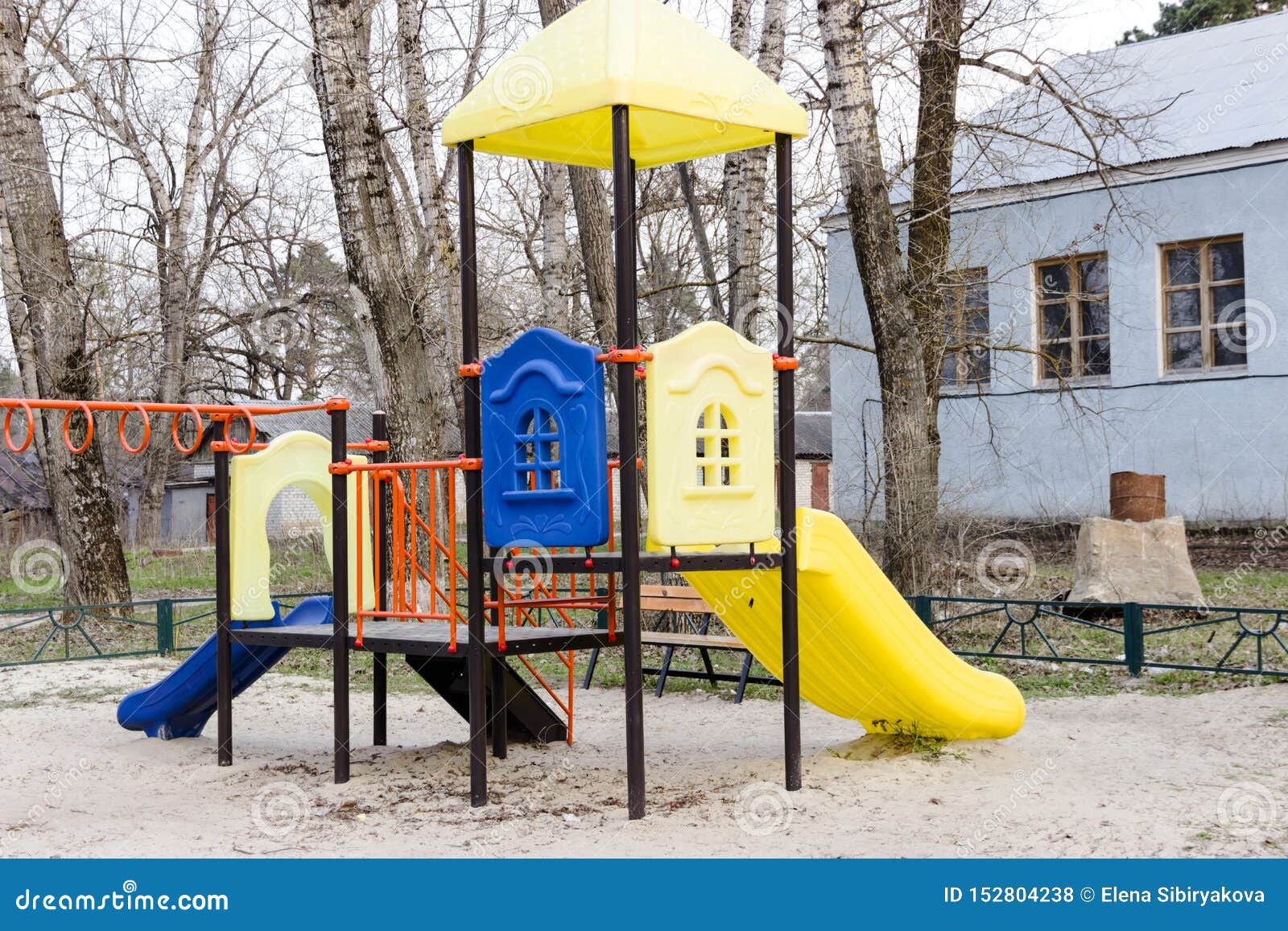 Multi-colored Slide on the Playground Stock Photo - Image of child ...