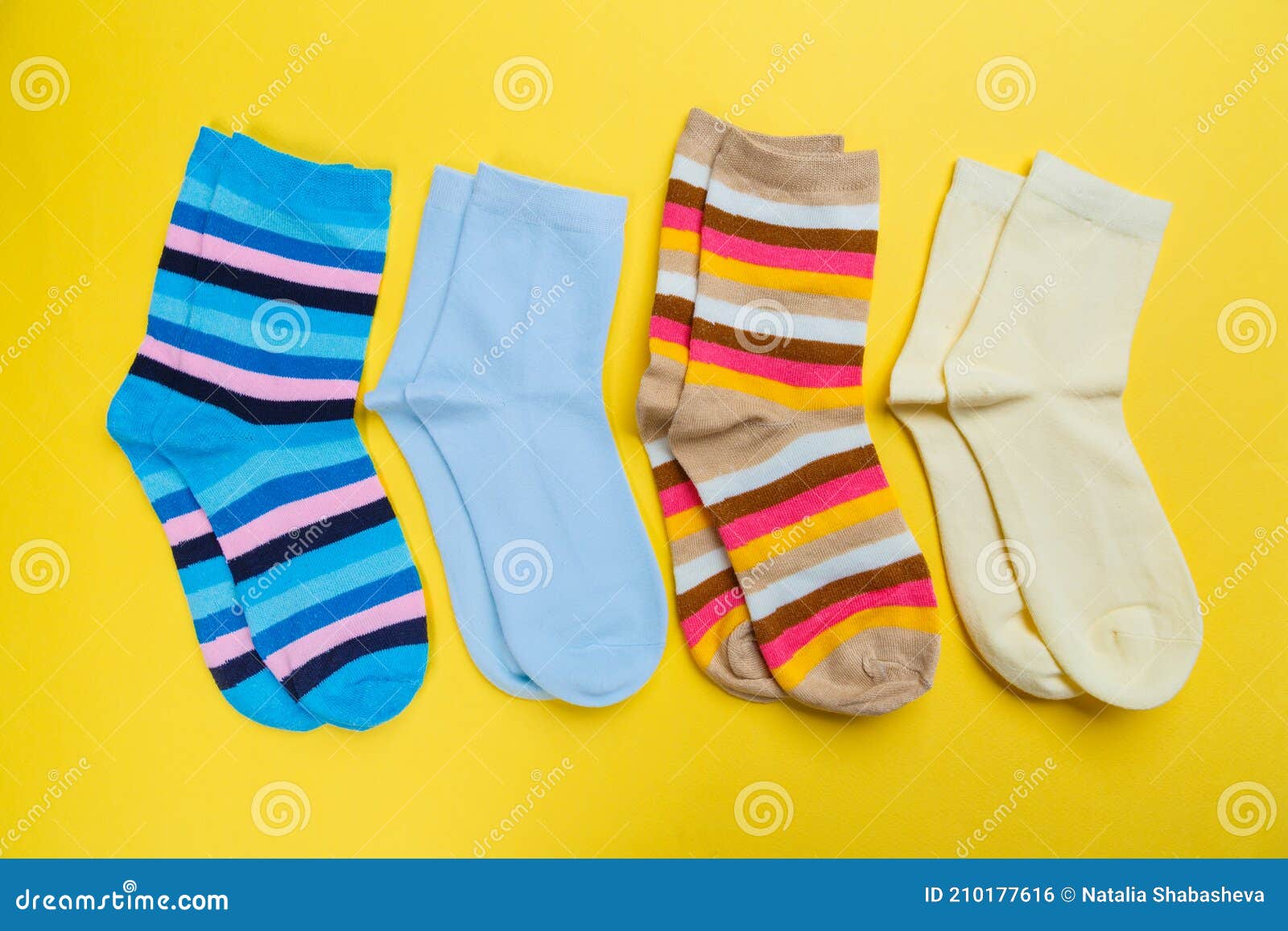 View from Above. Socks are Scattered on a Yellow Background. Clothing ...