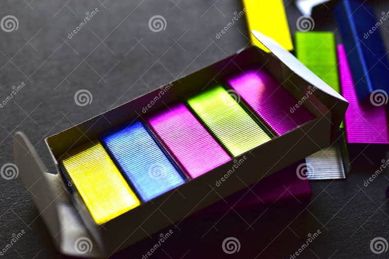 Multi-colored Stapler Staples on a Black Background Stock Image - Image ...
