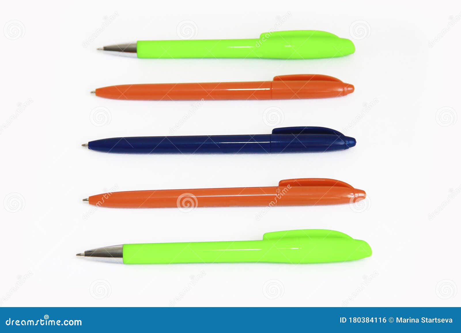Multi-colored Stationery Plastic Writing Pens on a White Background ...
