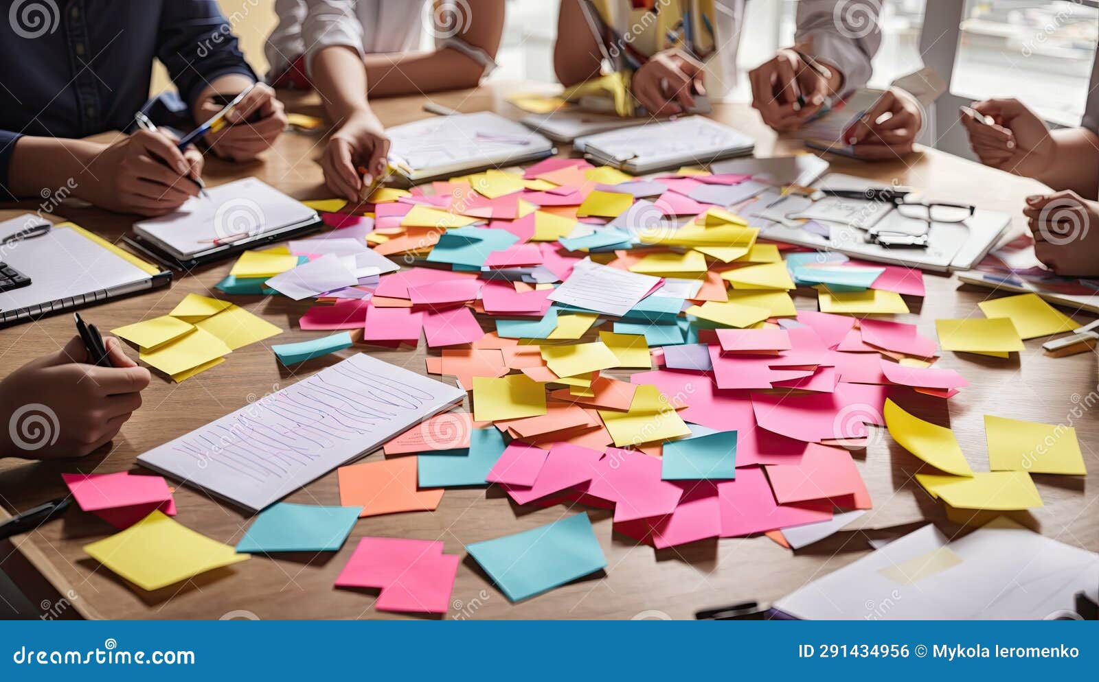 Multi-colored Sticky Notes Lying on the Table during the Discussion of ...