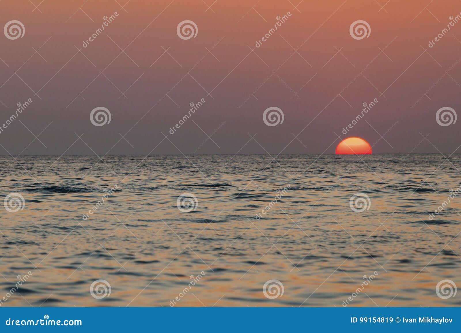 Sunset over sea stock image. Image of sunlight, ocean - 99154819