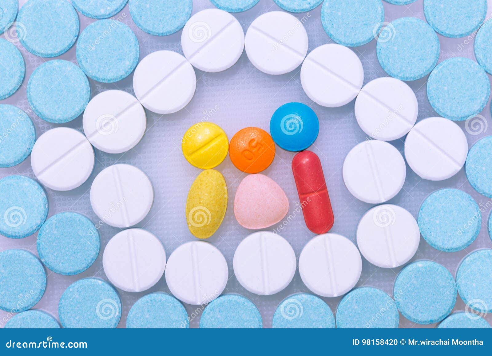 Tablets In The Form Of Arrows On Soft Pink Background. Royalty-Free ...