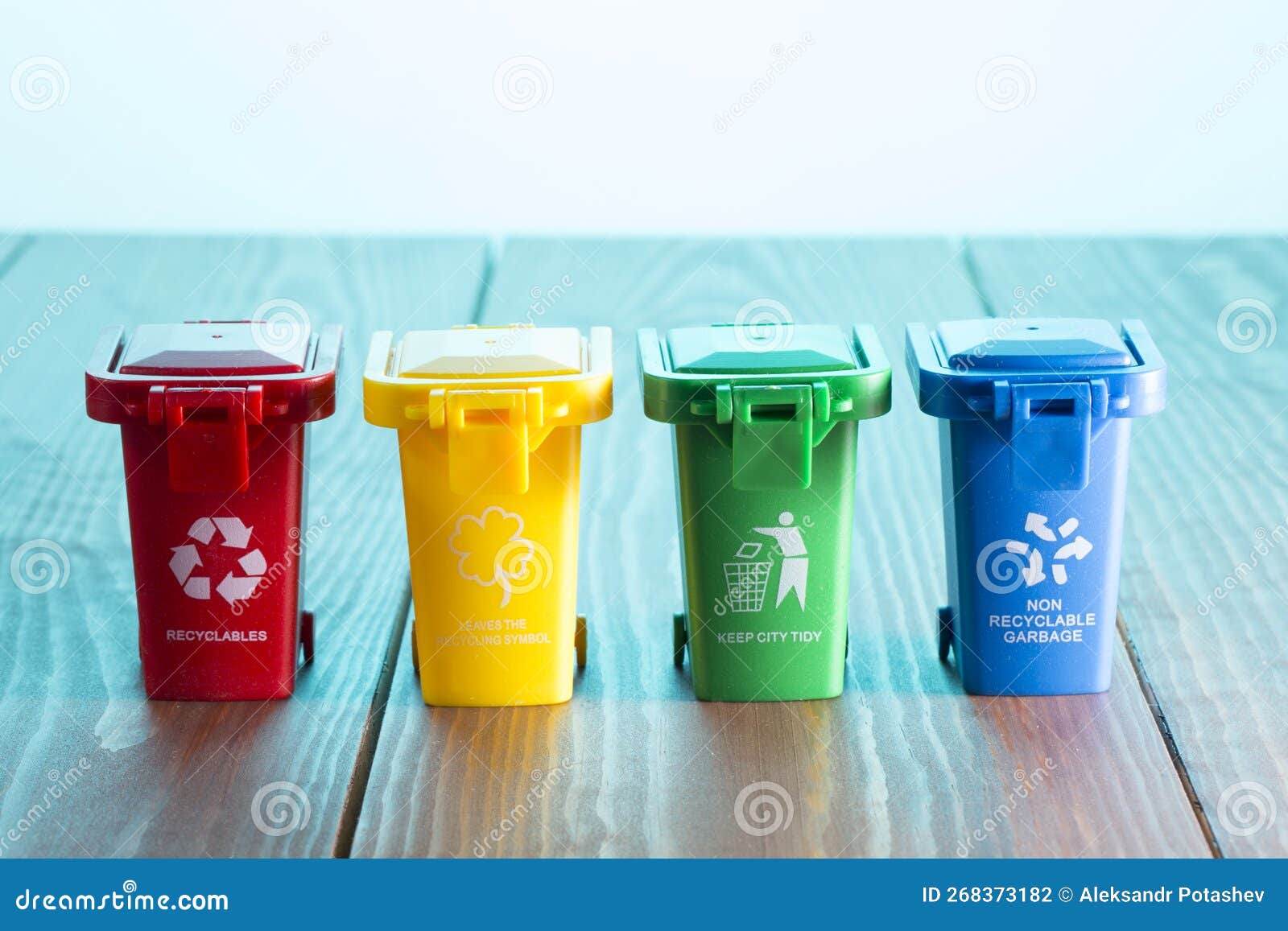 Multi - Colored Tanks for Separate Garbage Collection .Concept Stock ... Multi - Colored Tanks for Separate Garbage Collection .Concept Stock ...