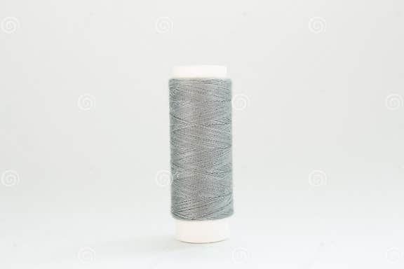 Grey Threads for Sewing on a White Background Stock Photo - Image of ...