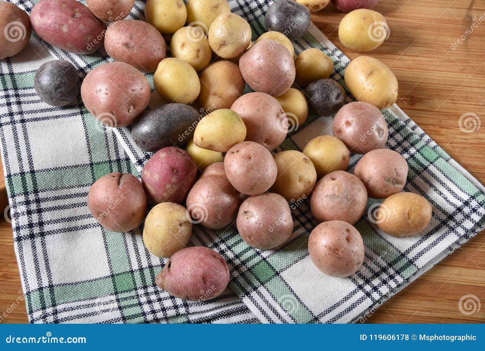 Multi-colored Tiny Potatoes Stock Photo - Image of potatoes, knife ...