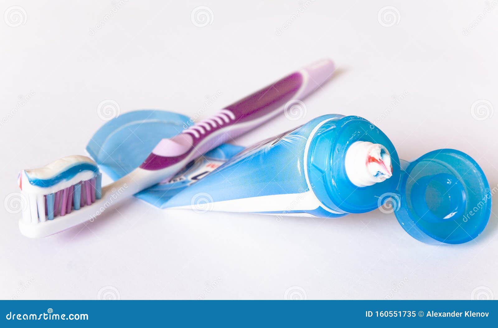 Multi-colored Toothpaste on a Toothbrush and Tube Stock Image - Image ...