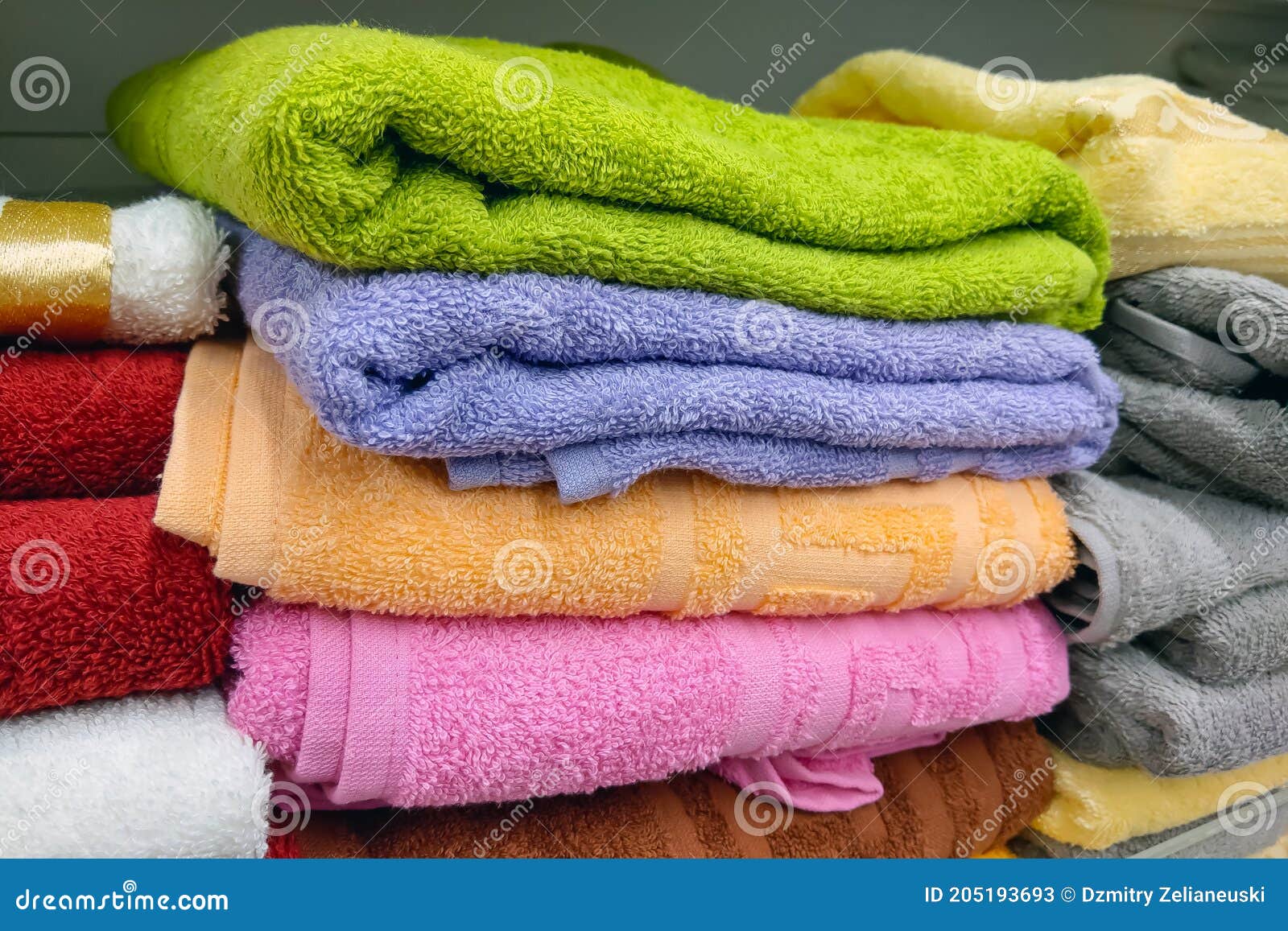 Multi-colored Towels are on the Shelf in the Machine Stock Image ...